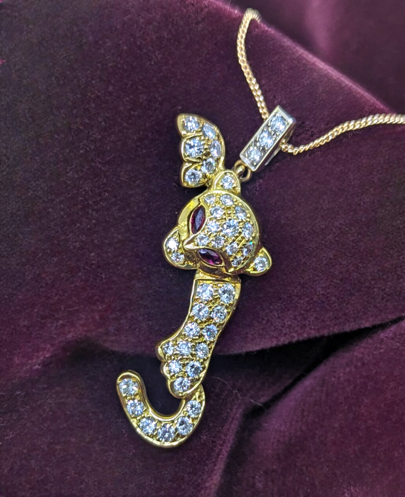18 Carat Gold Diamond and Ruby Panther Pendant and Chain | J Mccarthy’s